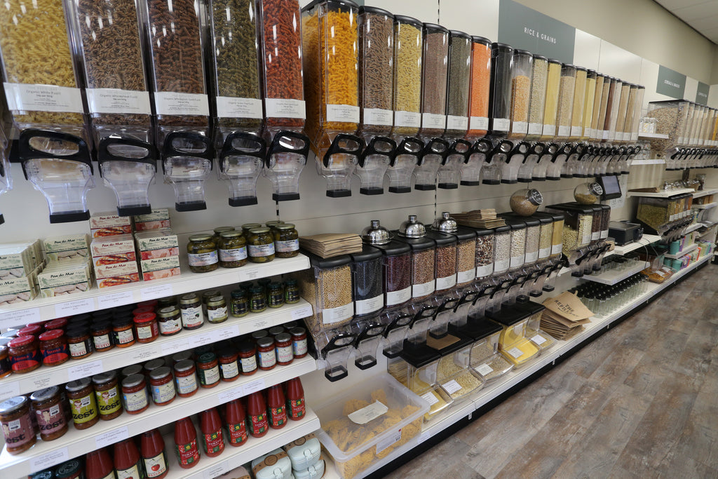 HL gravity dispensers help kick out plastic for grocery store